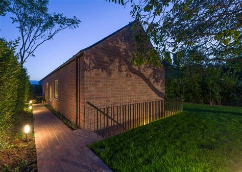 Long Brick House By Foldes Architects Has A 17 Metre Long Bookshelf