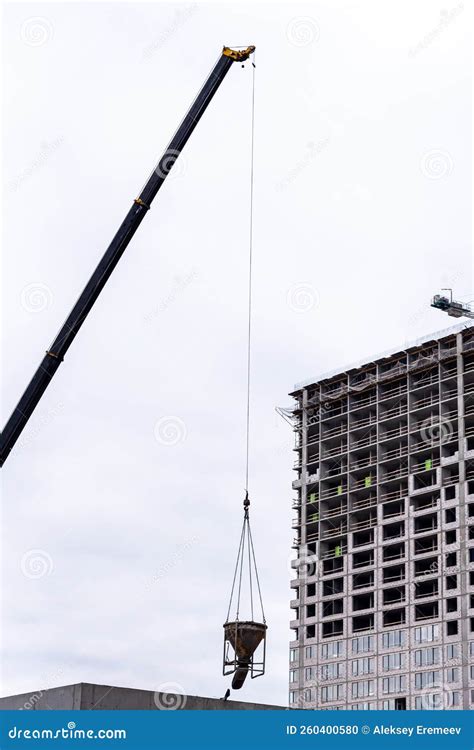 Crane Tower At The Construction Site Of A Multi Storey Residential