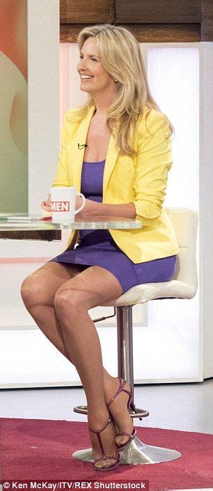 Penny Lancaster Shows Off Her Long Legs In A Short Purple Dress