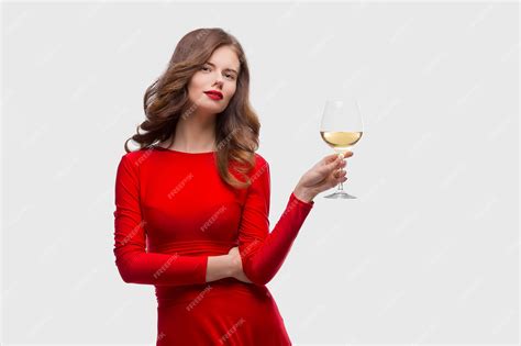 Premium Photo Beautiful Woman Holding Glass Of Wine Onwhite Space