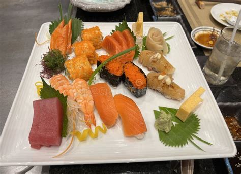 An Assorted Sashimi Set Served With A Variety Of Nigiri Sushi Stock