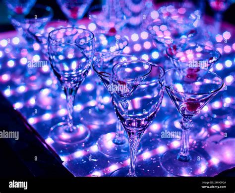 Empty Glasses Of Alcoholic Drinks On The Table With A Bright Light