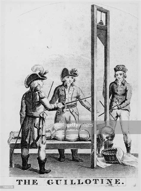 A Victim Undergoes Execution By Guillotine During The French