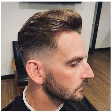 The Low Fade Slick Back A Bold Choice For The Confident Man Mens