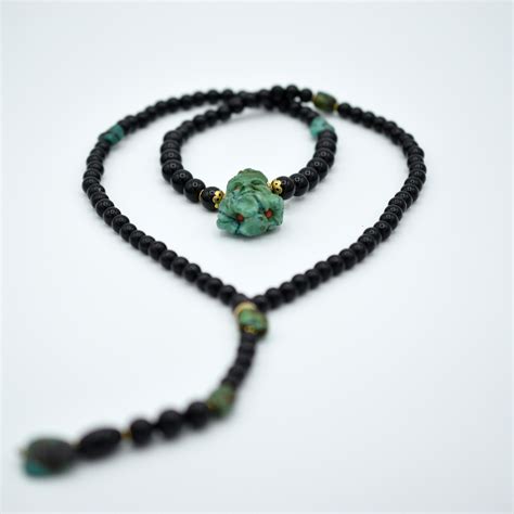 מחרוזת אוניקס משולבת אבן מרכזית טורקיז טיבטי מפוסל Mamo