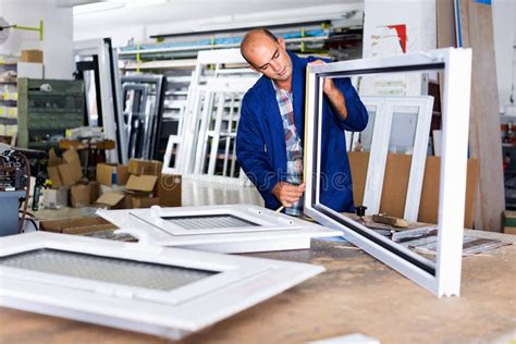 Man Working In Workshop For Assembling Plastic Windows Stock Image Image Of Female Emotion