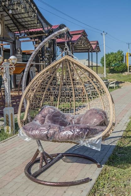 Premium Photo Rattan Swing Garden Cocoon Garden Furniture