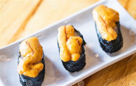 Uni Sushi On A White Plate Sea Urchinuni Sashimi Japanese Food
