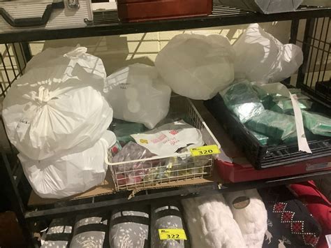 Assorted Items Including Rolling Papers Plastic Cylinder Containers And More Able Auctions