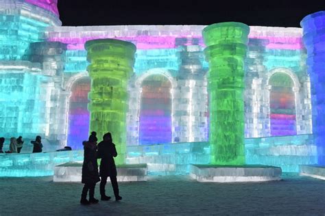Giant Ice Sculptures Glow In Hot Neon At Winter Festival In Harbin China