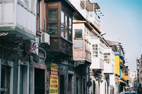 Premium Photo Bicycle Hanging Outside Building
