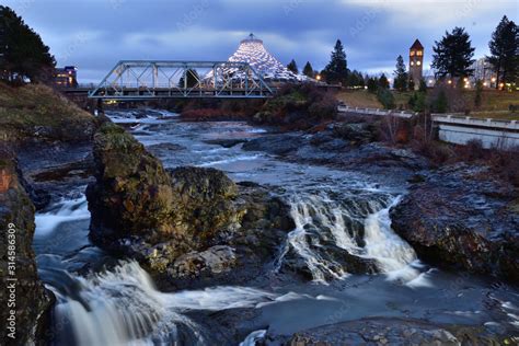 Long Exposure Sunrise Photo Of Spokane Falls On The Spokane River Looking Over Riverfront Park