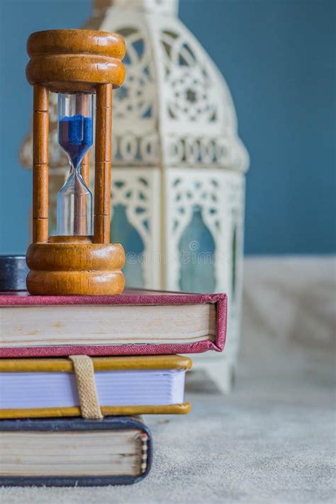Hourglass On A Book Stock Image Image Of Knowledge Magnifier 58643951