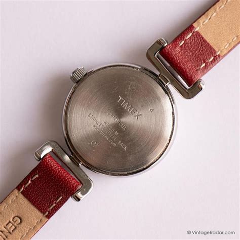 Tiny Vintage Silver Tone Timex Watch For Ladies With Dark Red Strap