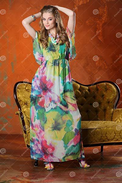Attractive Slender Happy Blonde Model Posing In Full Height On High