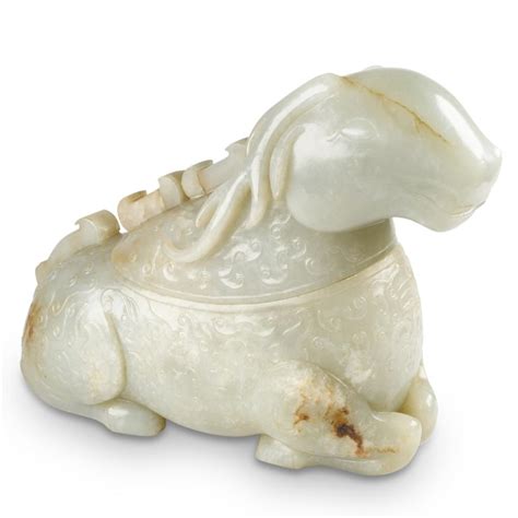 Lot A Rare And Large Chinese White Jade Carved Ram Formed Archaistic