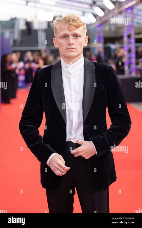 George Jaques Poses For Photographers Upon Arrival For The Premiere Of