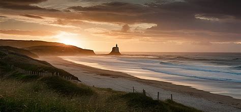 Coastal Tranquility Background Shore Rocky Sea Background Image And