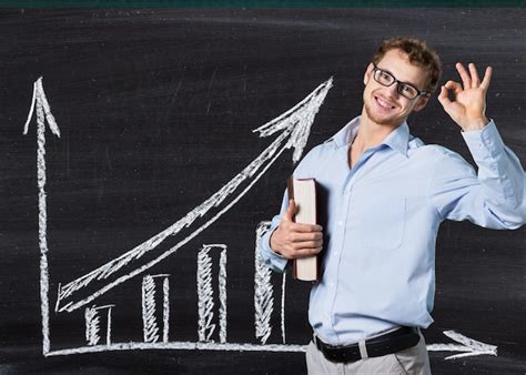 Premium Photo Young Funny Man In Glasses Against Chalk Blackboard