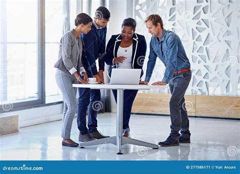 Collaboration Is This Teams Key To Success A Group Of Coworkers