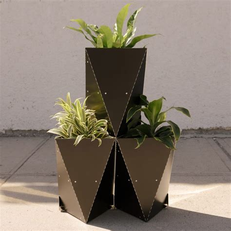 Prism Planters By The Principals Stack Up Into Arches And Pyramids