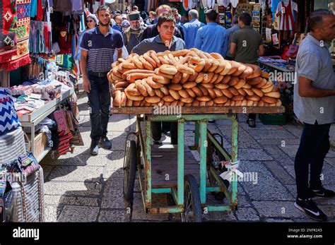 Jerusalem Israel Carrying Bread In The Streets Of The Old City Stock