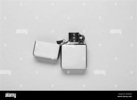 Gray Metallic Cigarette Lighter On White Background Top View Stock Photo Alamy