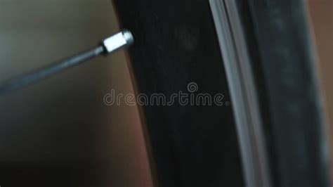 In A Close Up Video The Spinning Bicycle Tire Is Captured In
