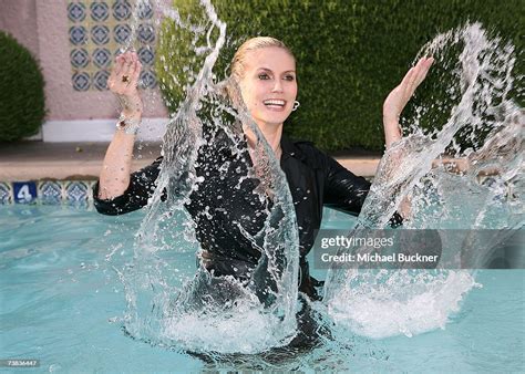 Heidi Klum Poses In The Pool To Promote Her New Qvc Collection At The