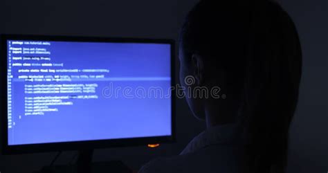 Portrait Of Young Woman Hacker Programmer Working At A Computer In The Data Center Stock Video