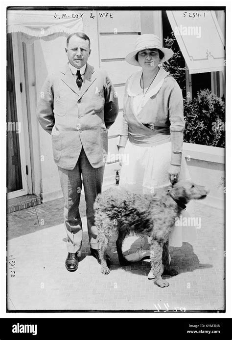 A Historical Photograph Showing J M Cox And His Wife With Their