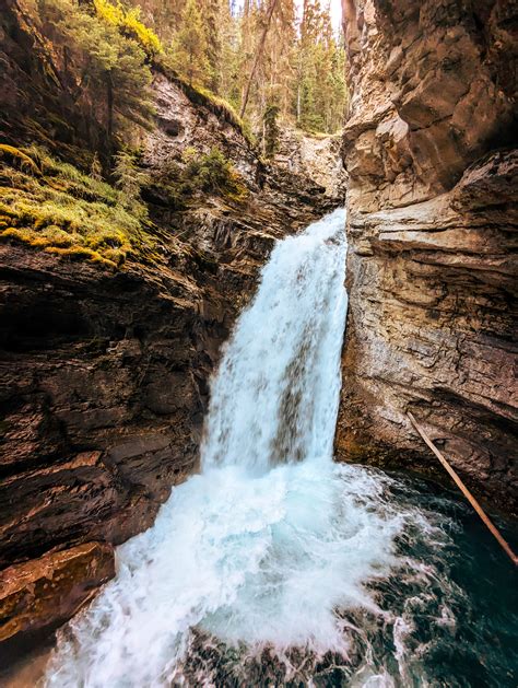 Johnston Canyon Banff A Cant Miss Hike With Stunning Waterfalls Peach Skies And Warm Sand