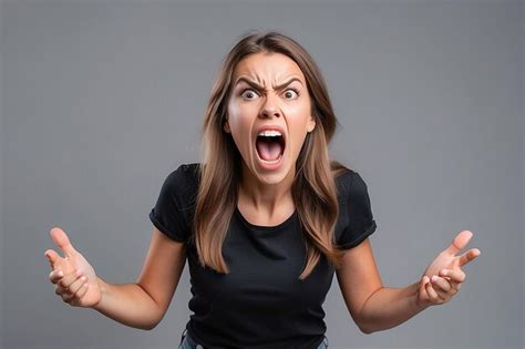 Premium Photo Angry Screaming Young Caucasian Lady Standing Isolated