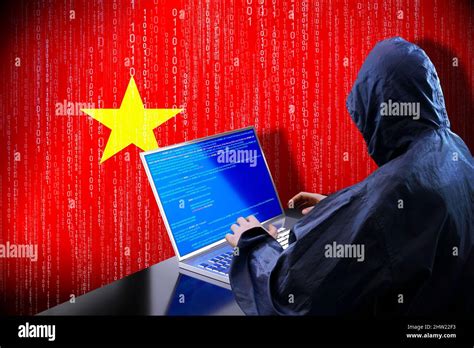 anonymous hooded hacker flag of vietnam binary code cyber attack