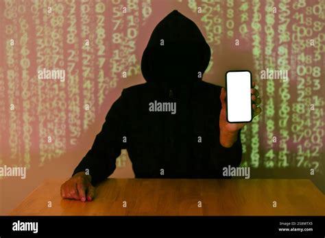 Dark Face Hacker Holding Smartphone With Isolate Screen Over Binary Code Digital Background
