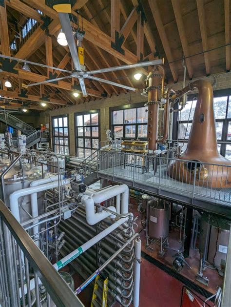 Interior Of Whiskey Distillery With Copper Still And Industrial