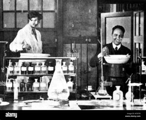 A Historical Photograph Of Professor P E Verkade And His Wife In A Laboratory Setting Possibly