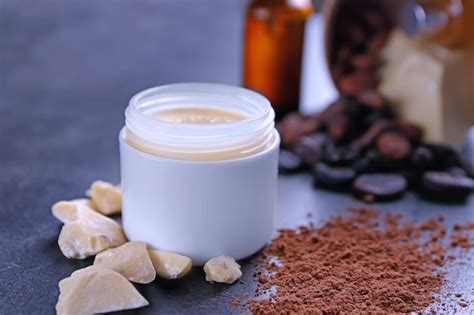Premium Photo Beautiful Composition With Cocoa Butter Lotion On Table
