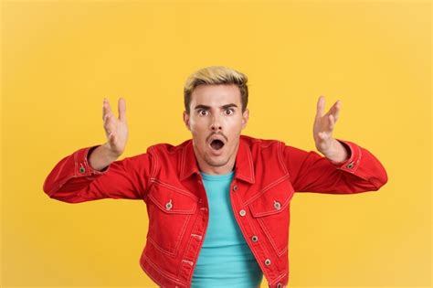 Premium Photo Surprised Gay Man Gesturing And Looking At The Camera