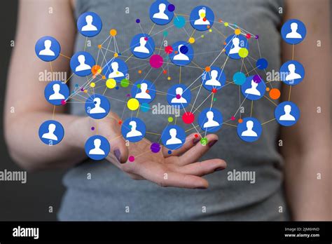 a person holding a floating digital render of interconnected profile