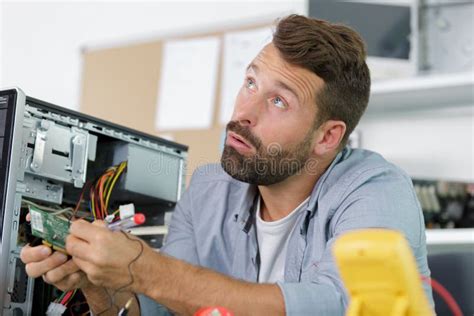 Professional Man Repairing And Assembling Computer Stock Image Image