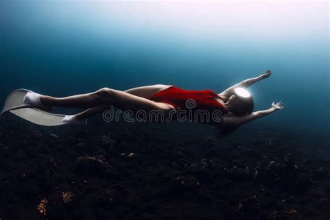 Woman Freedives Young Sporty Female Freediver Swims Underwater In Deep