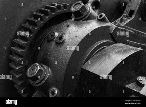 Massive Black Gears And Other Parts Of Vintage Industrial Machine