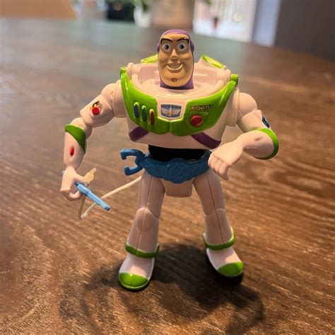 Disney Toys Buzz Lightyear With Grappling Hook Poshmark