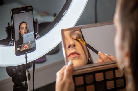 Premium Photo Closeup Shot Of A Young Caucasian Female Doing Makeup