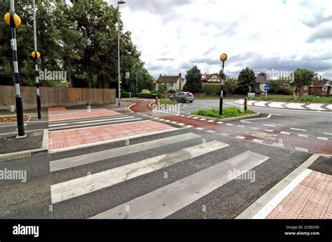 Pedestrian Crossing And Inner Cycle Only Lane Leading To The Roundabout