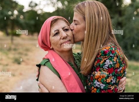 Daughter Kissing Mother Hi Res Stock Photography And Images Alamy