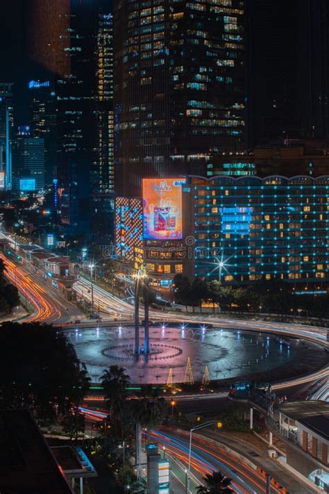 night cityscape and traffic light of highway in slow speed shutter