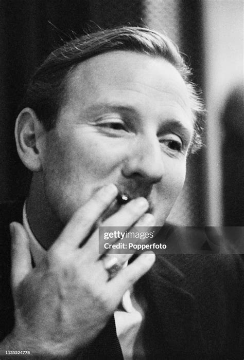 English Actor Leslie Phillips Smoking A Cigarette In February 1964