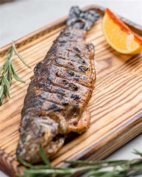 Premium Photo Grilled Mackerel On A Cutting Board